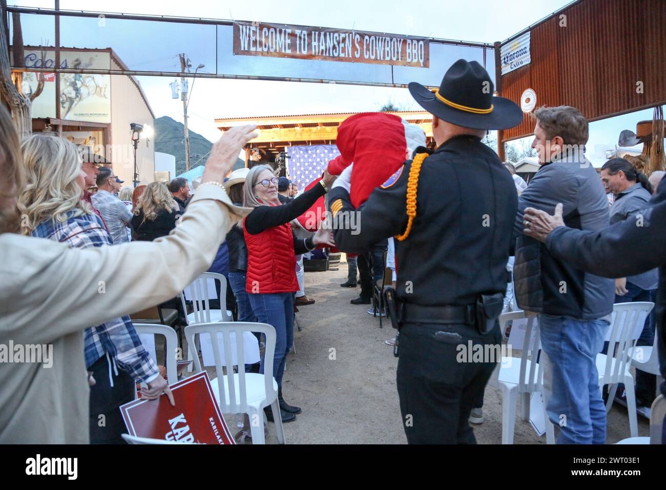 The flag from the US Arizona gets unfurled amongst the audience before ...