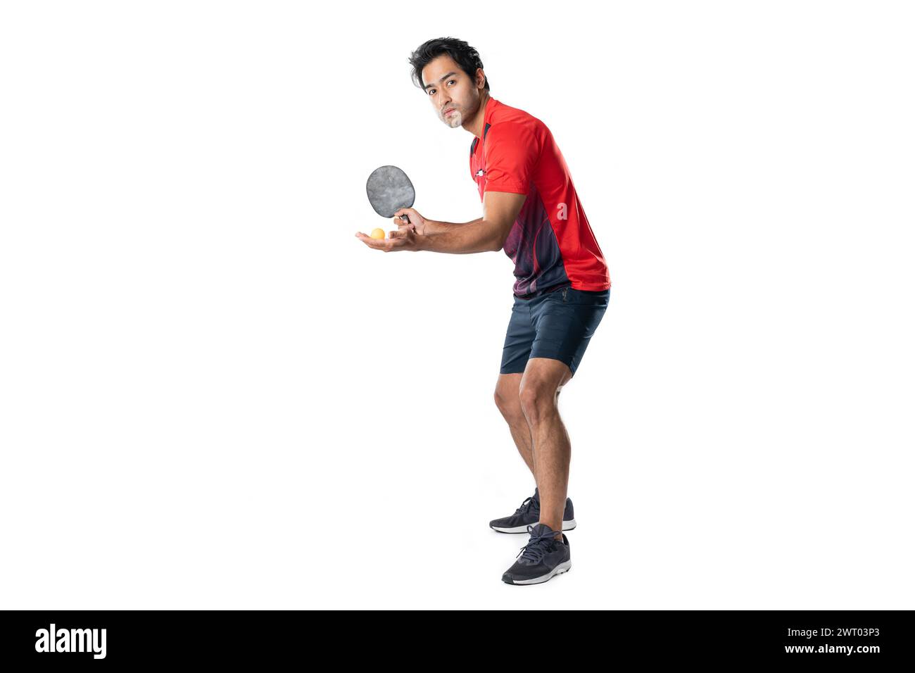 Portrait of sports man male athlete playing table tennis isolated on ...