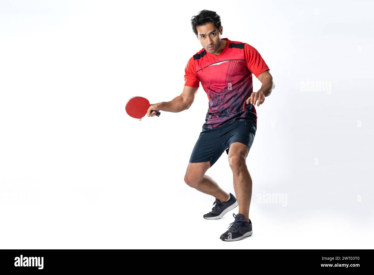 Portrait of sports man male athlete playing table tennis isolated on ...