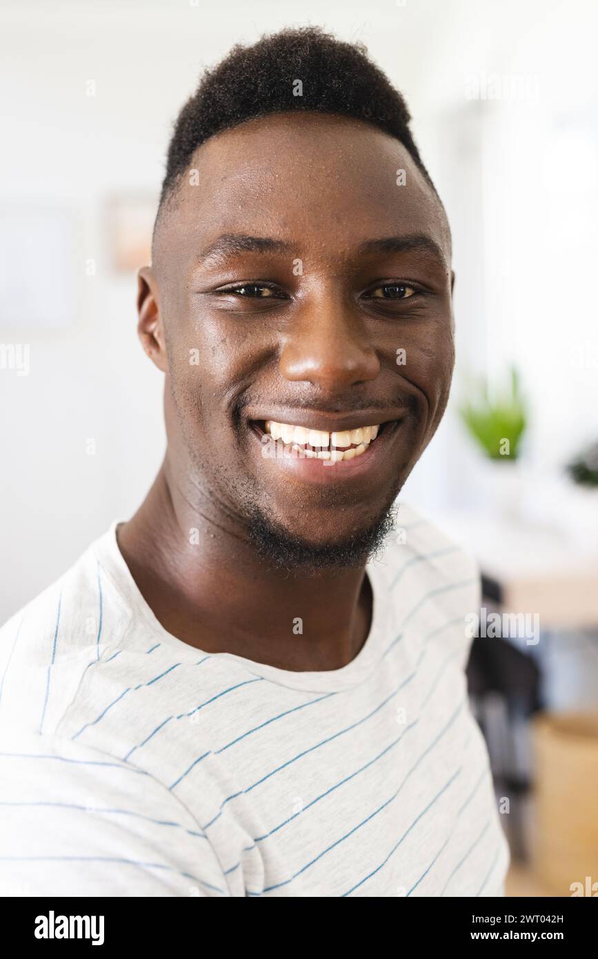 Attractive young man home hi-res stock photography and images - Alamy
