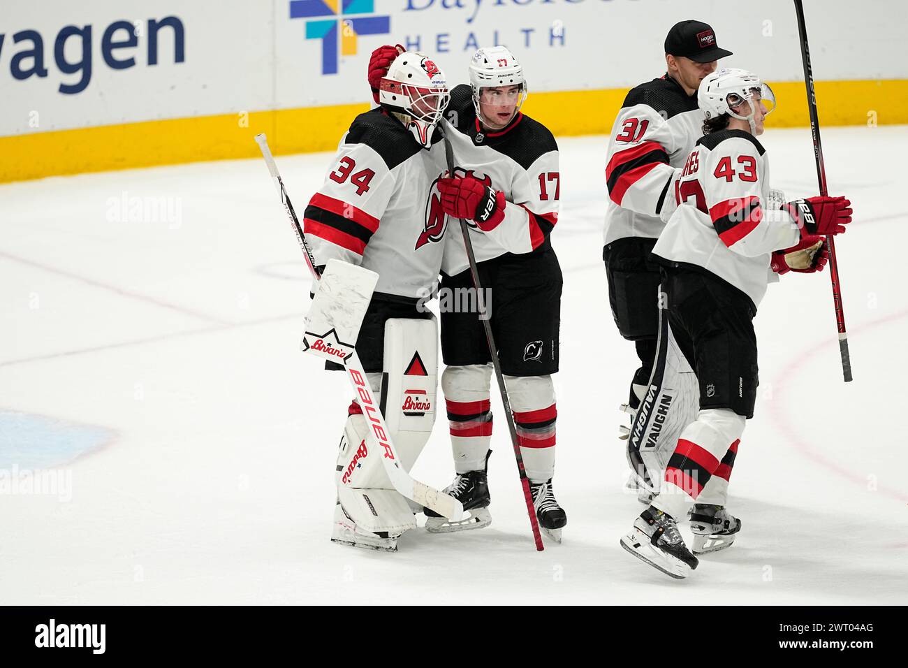 New Jersey Devils' Jake Allen (34), Simon Nemec (17), Kaapo Kahkonen ...