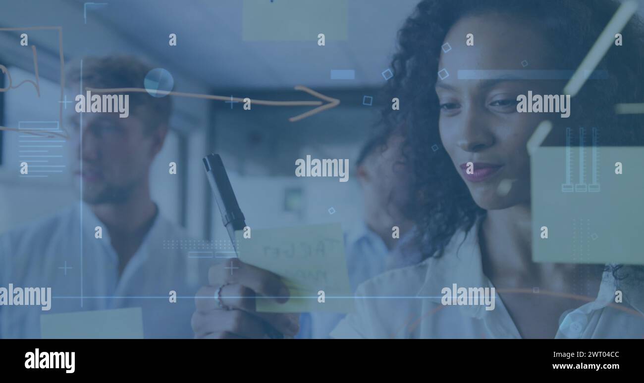 Image of data processing over diverse business people taking notes ...