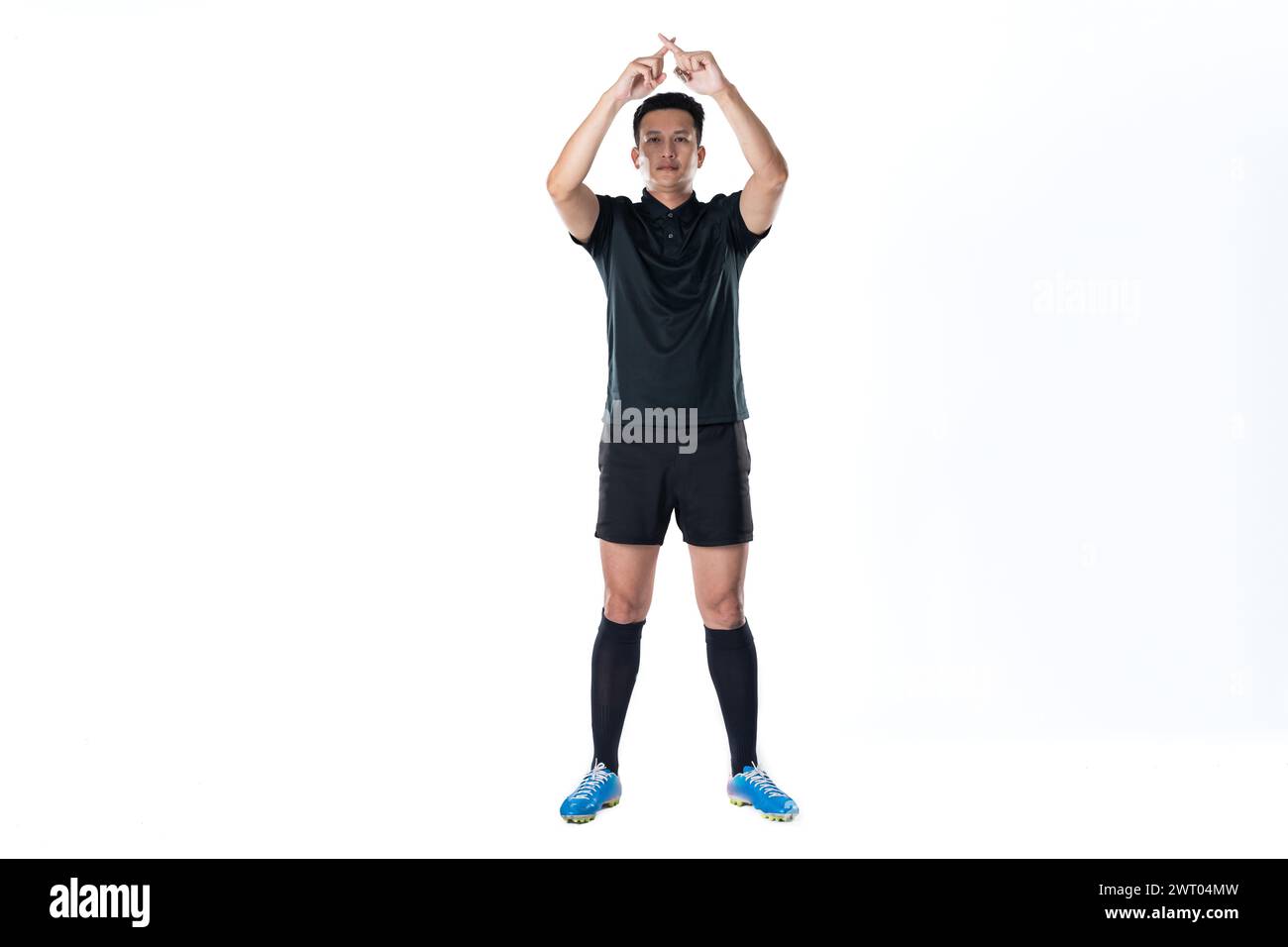 Football referee showing VAR symbol on white background Stock Photo - Alamy