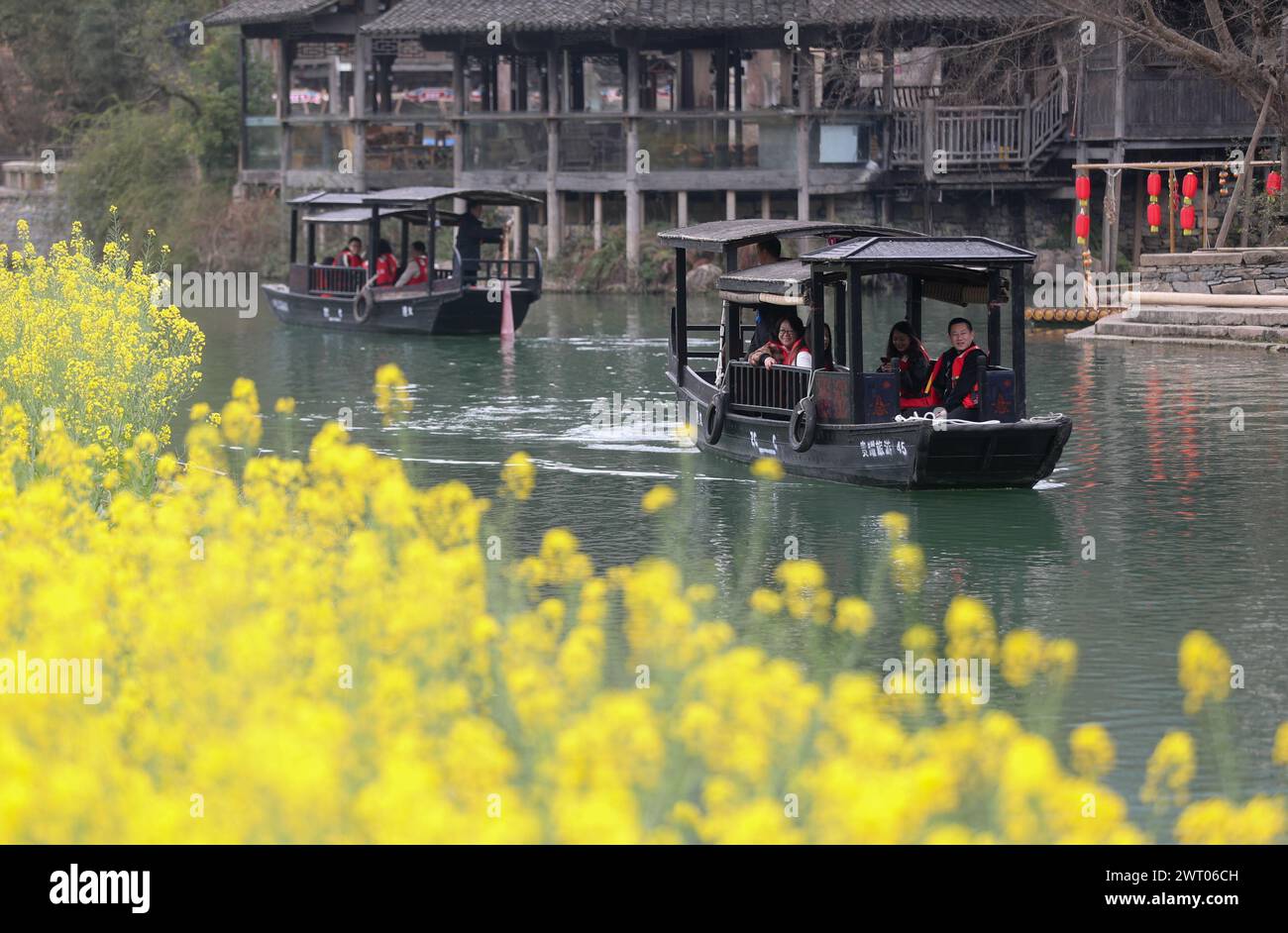 Zunyi, China's Guizhou Province. 14th Mar, 2024. Tourists take boats at ...