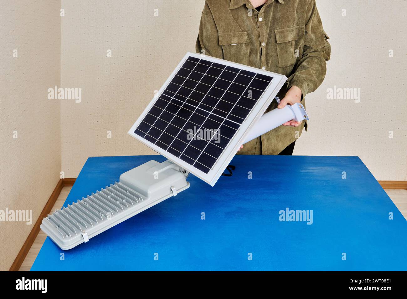 Solar powered led street lights during Installation, screw fixing ...