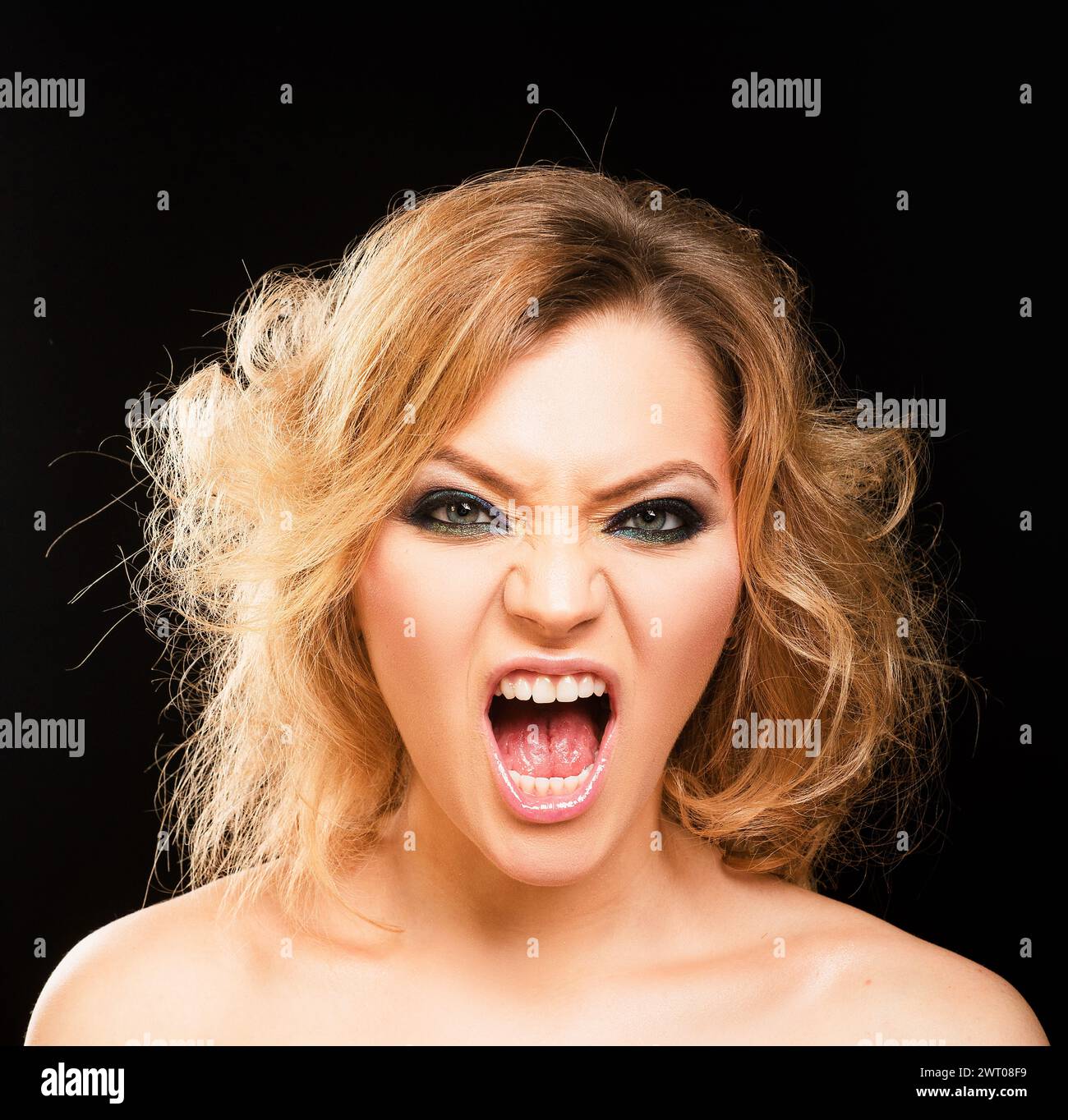 Female fashion makeup. Screaming girl portrait. Angry woman. People emotion, negative feelings ...