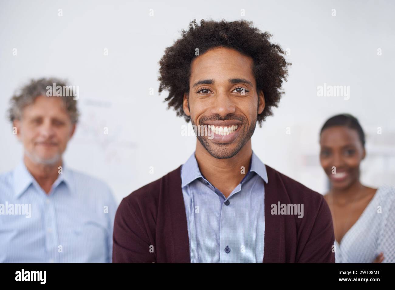 Man, smile and portrait in office with colleagues for collaboration ...