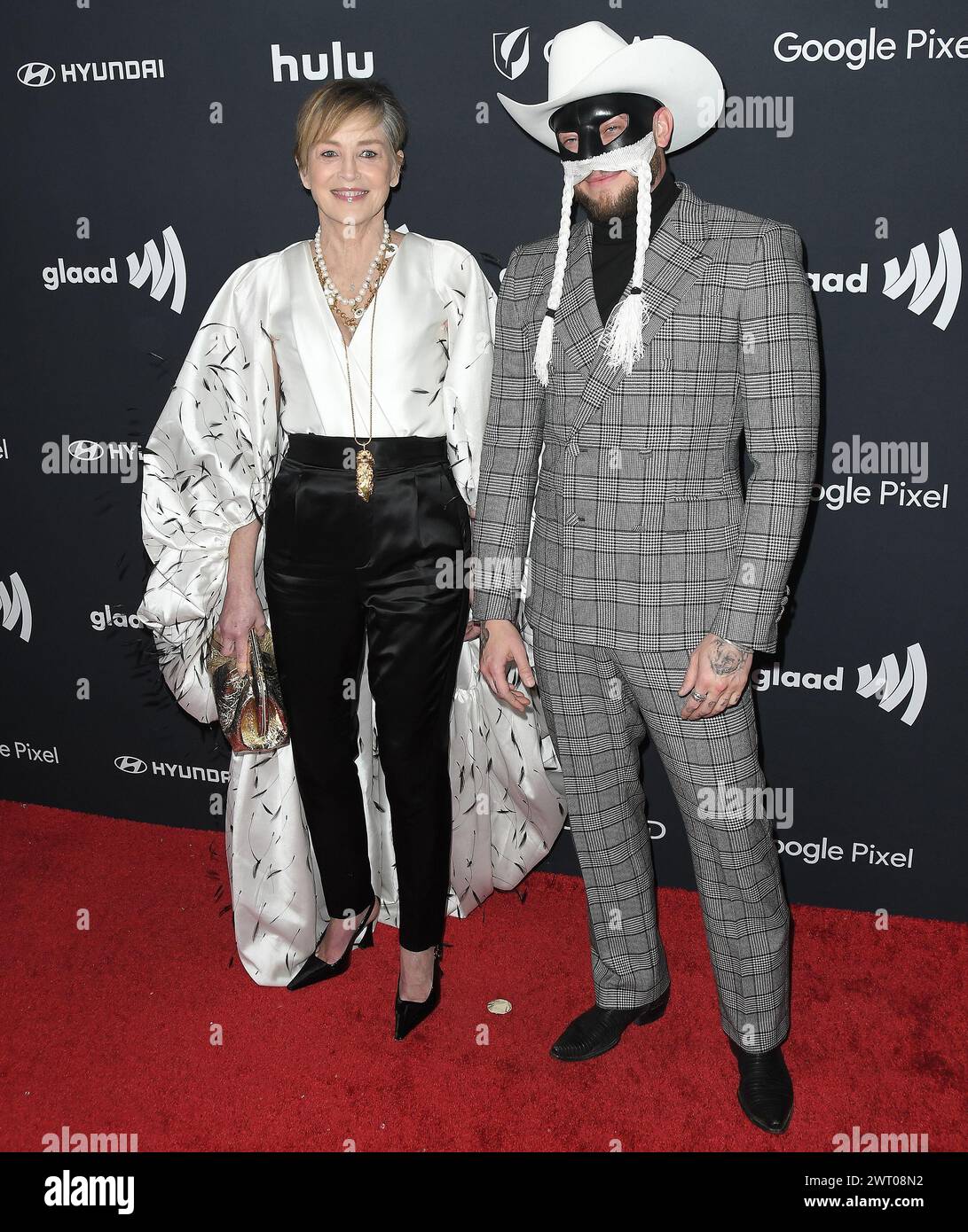 Los Angeles, USA. 14th Mar, 2024. (L-R) Sharon Stone and Orville Peck ...