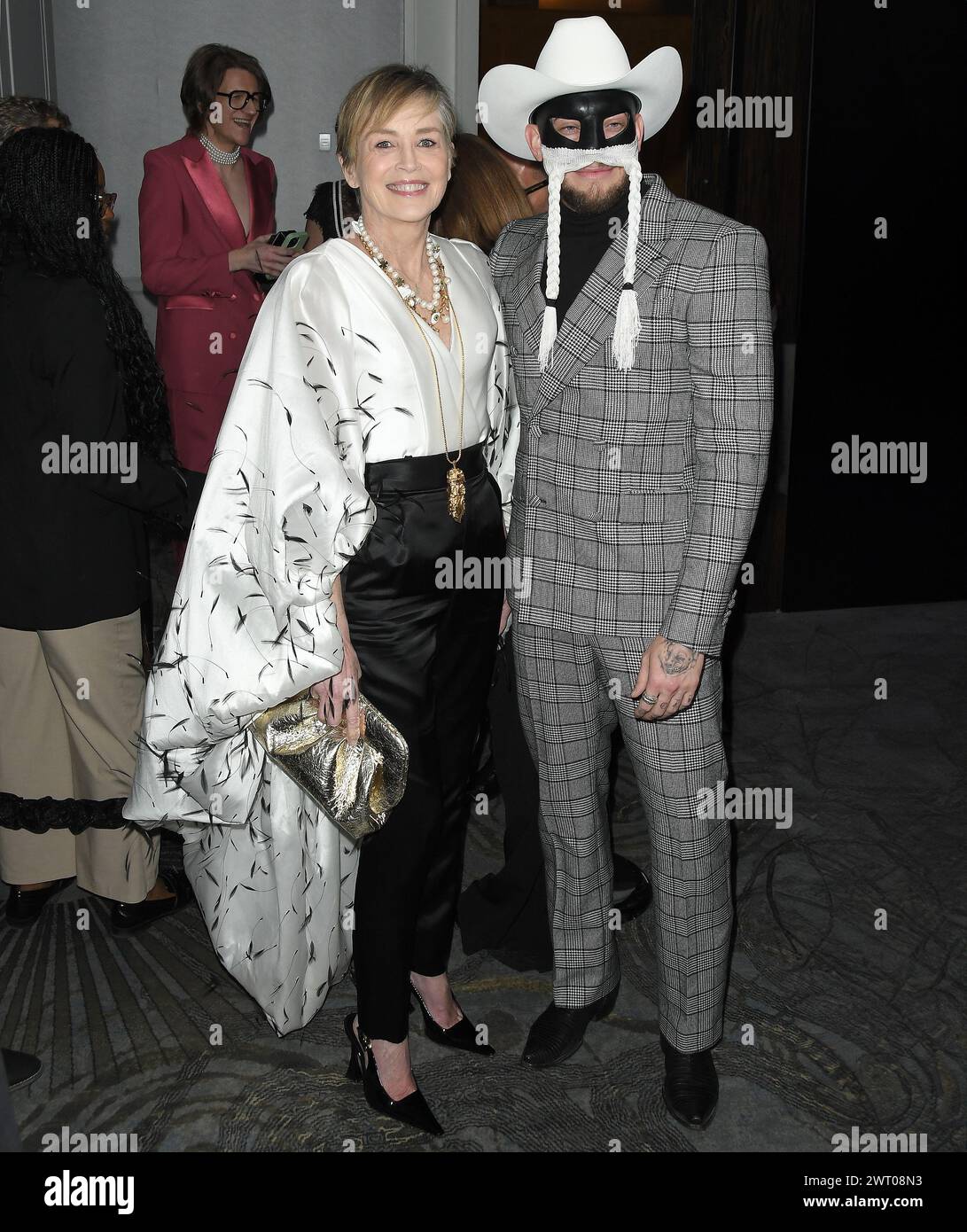 Los Angeles, USA. 14th Mar, 2024. (L-R) Sharon Stone and Orville Peck ...