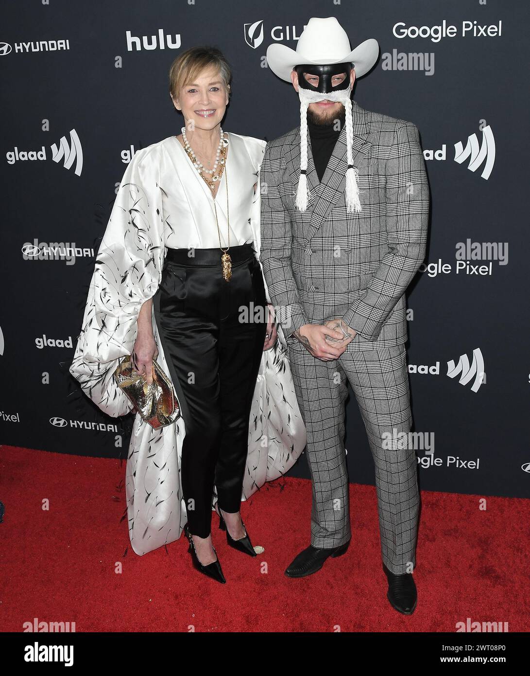Los Angeles, USA. 14th Mar, 2024. (L-R) Sharon Stone and Orville Peck ...