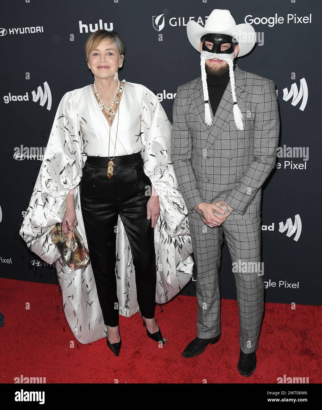 Los Angeles, USA. 14th Mar, 2024. (L-R) Sharon Stone and Orville Peck ...