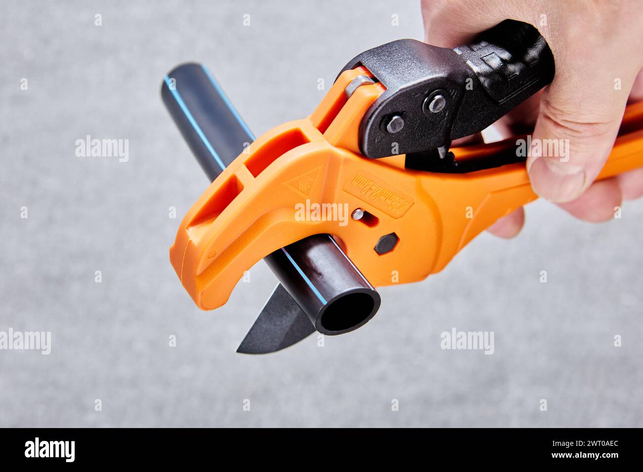 PVC pipe cutting ratchet scissors cutter, on gray background Stock ...