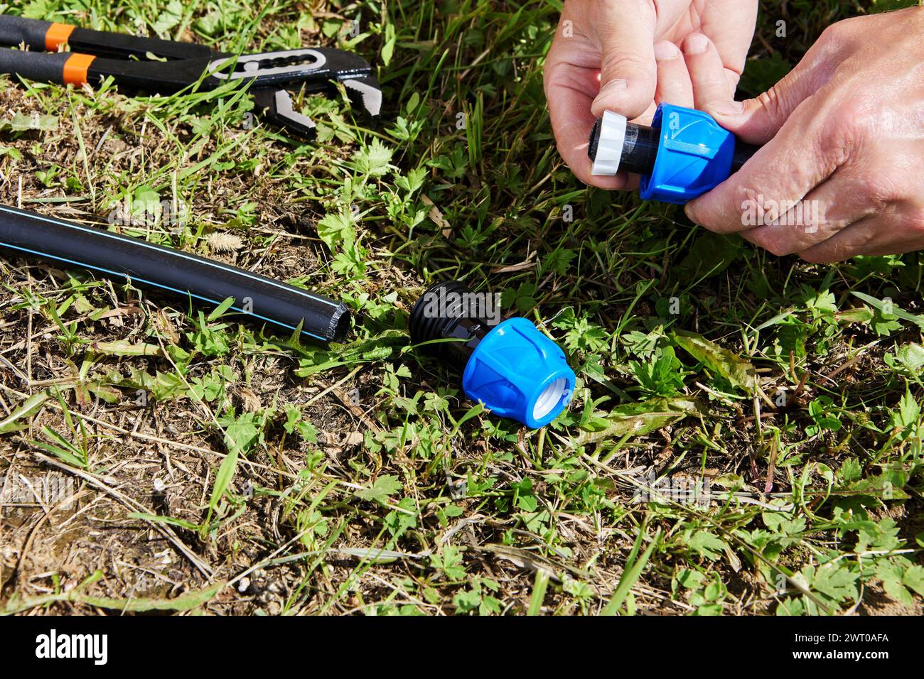 Compression coupling fitting is connected to pipeline for watering ...