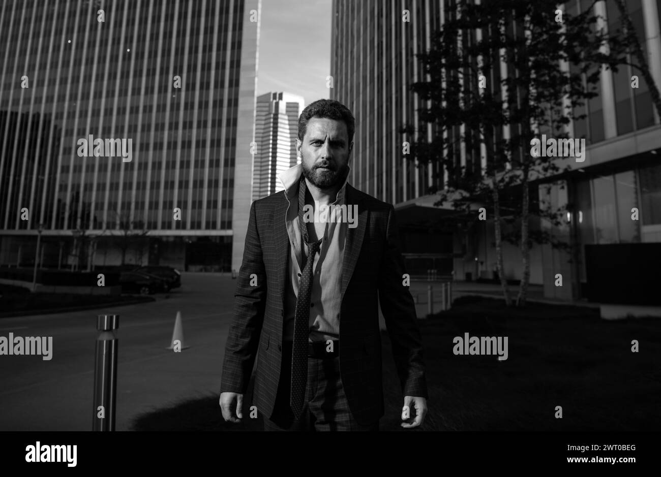 Tired business man after hard working day near office. Business concept ...