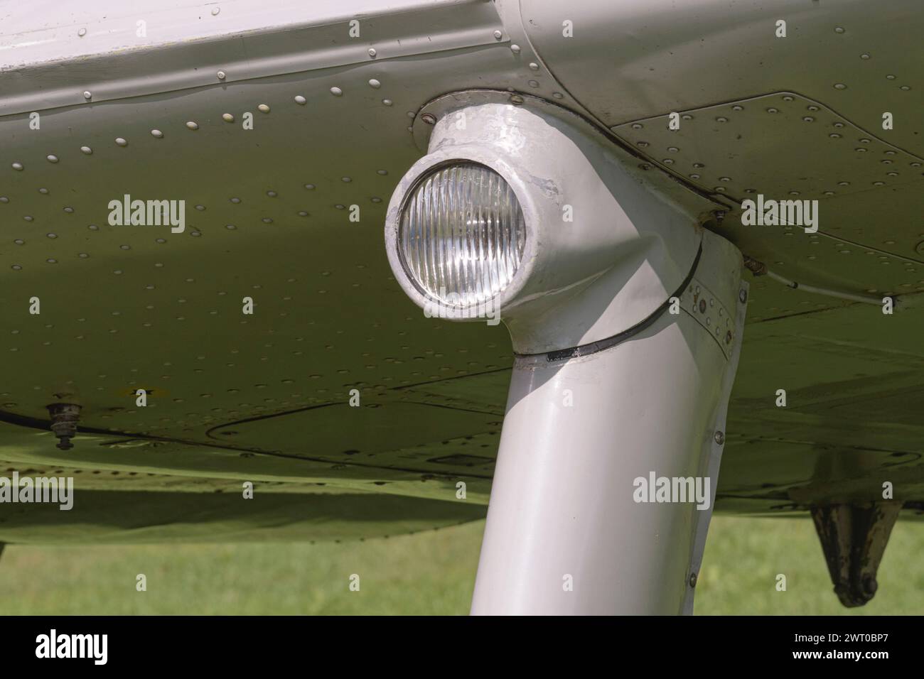 Close-up of an old airplane wing and lamp. rivet texture Stock Photo ...