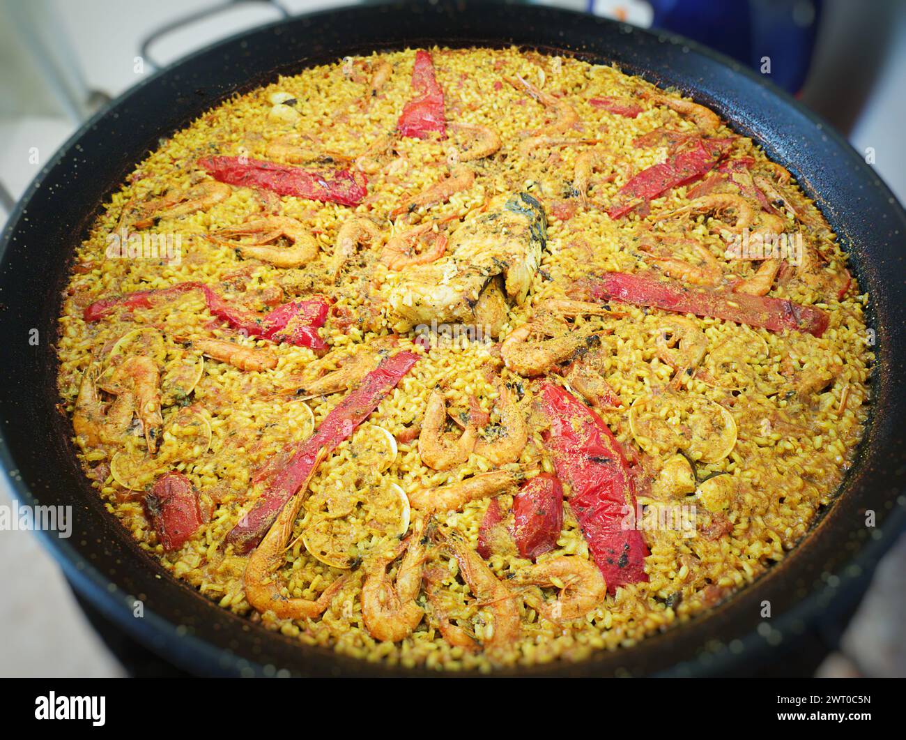 Homemade seafood rice called paella in Spain. Horizontal shot with ...