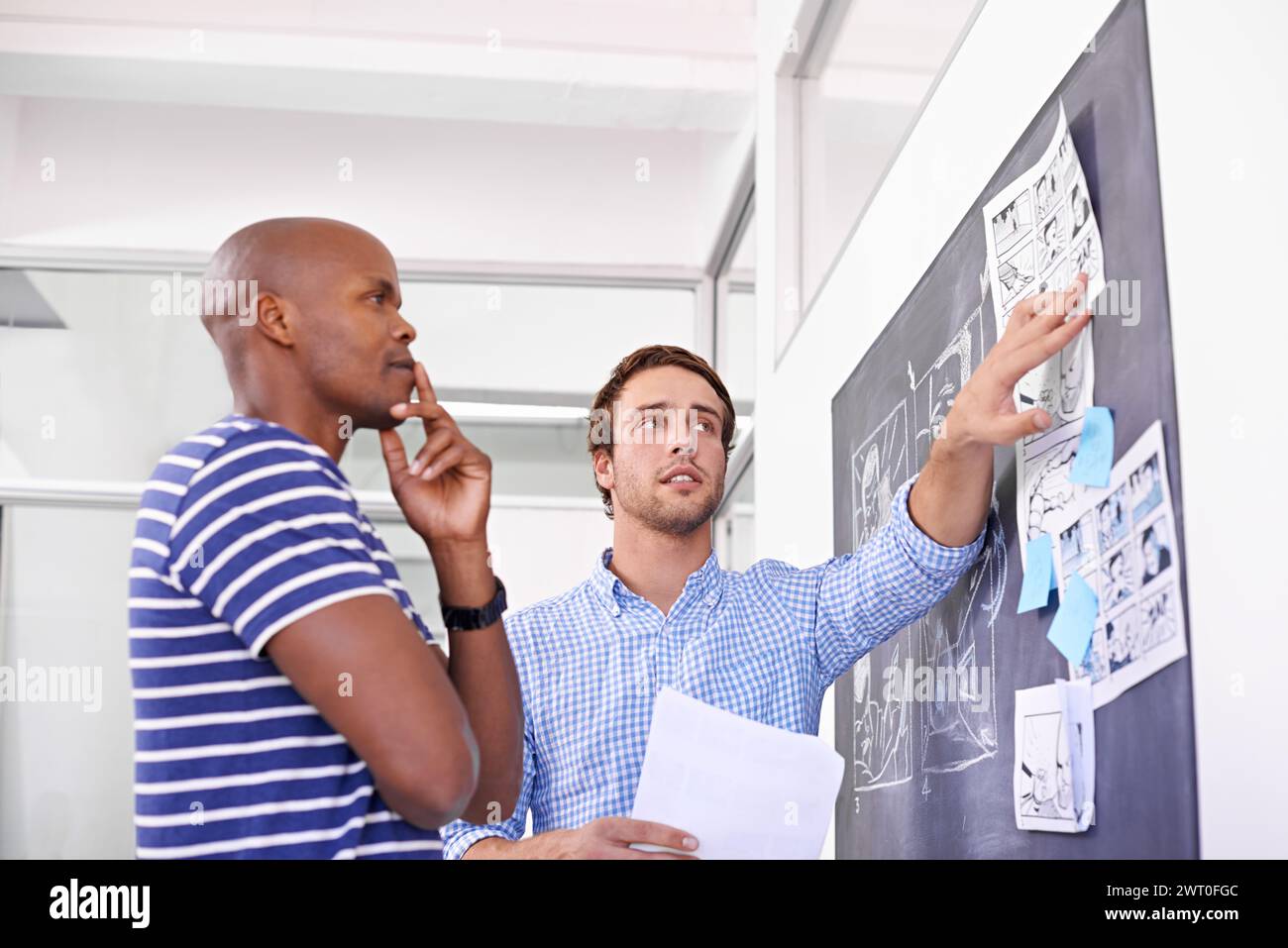 Business people, thinking and creative by chalkboard in office for ...