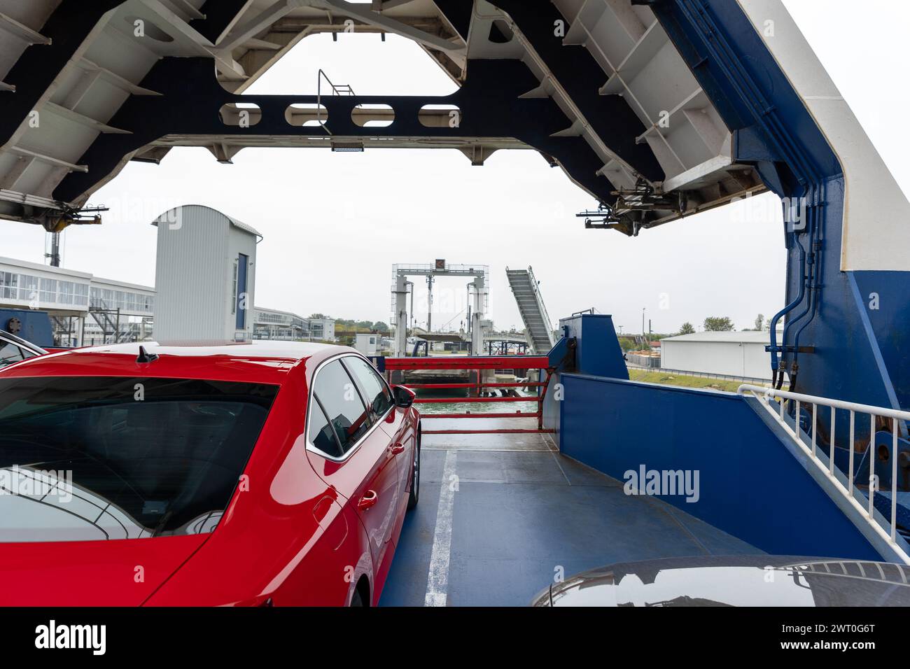 Front open door of passenger freight cargo ferry boat vessel ship with ...