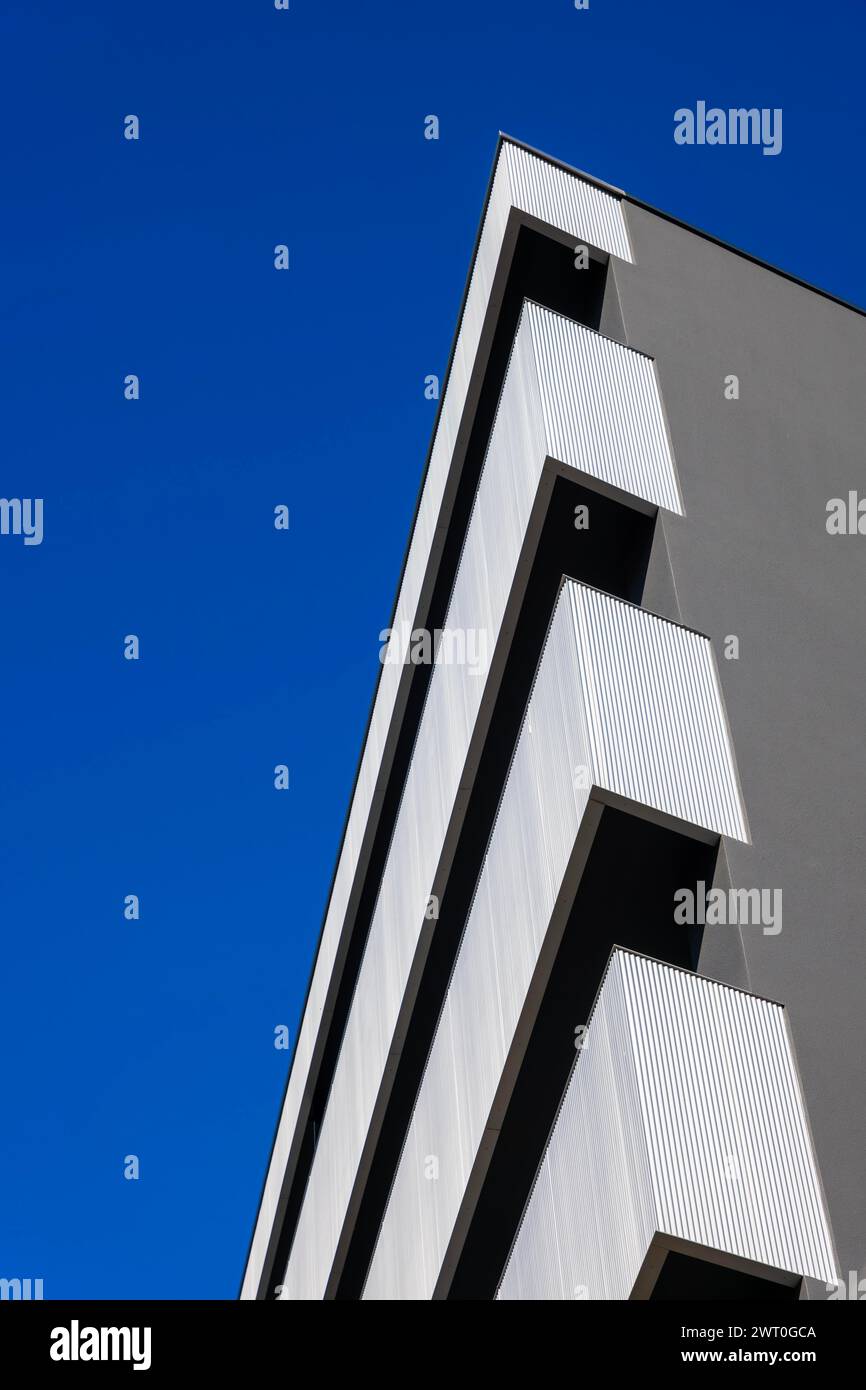 Beautiful Modern Concrete Design Building with Metal Balcony Against ...