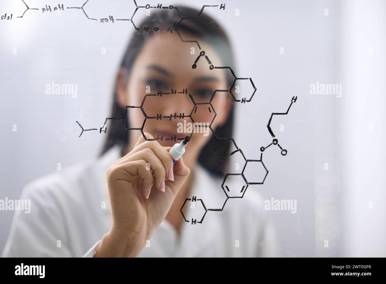 Board, hand and scientist drawing molecule for chemistry, research or ...