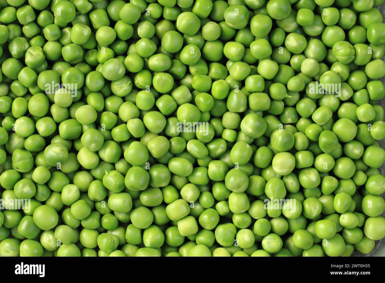 fresh green pea as natural food background Stock Photo - Alamy