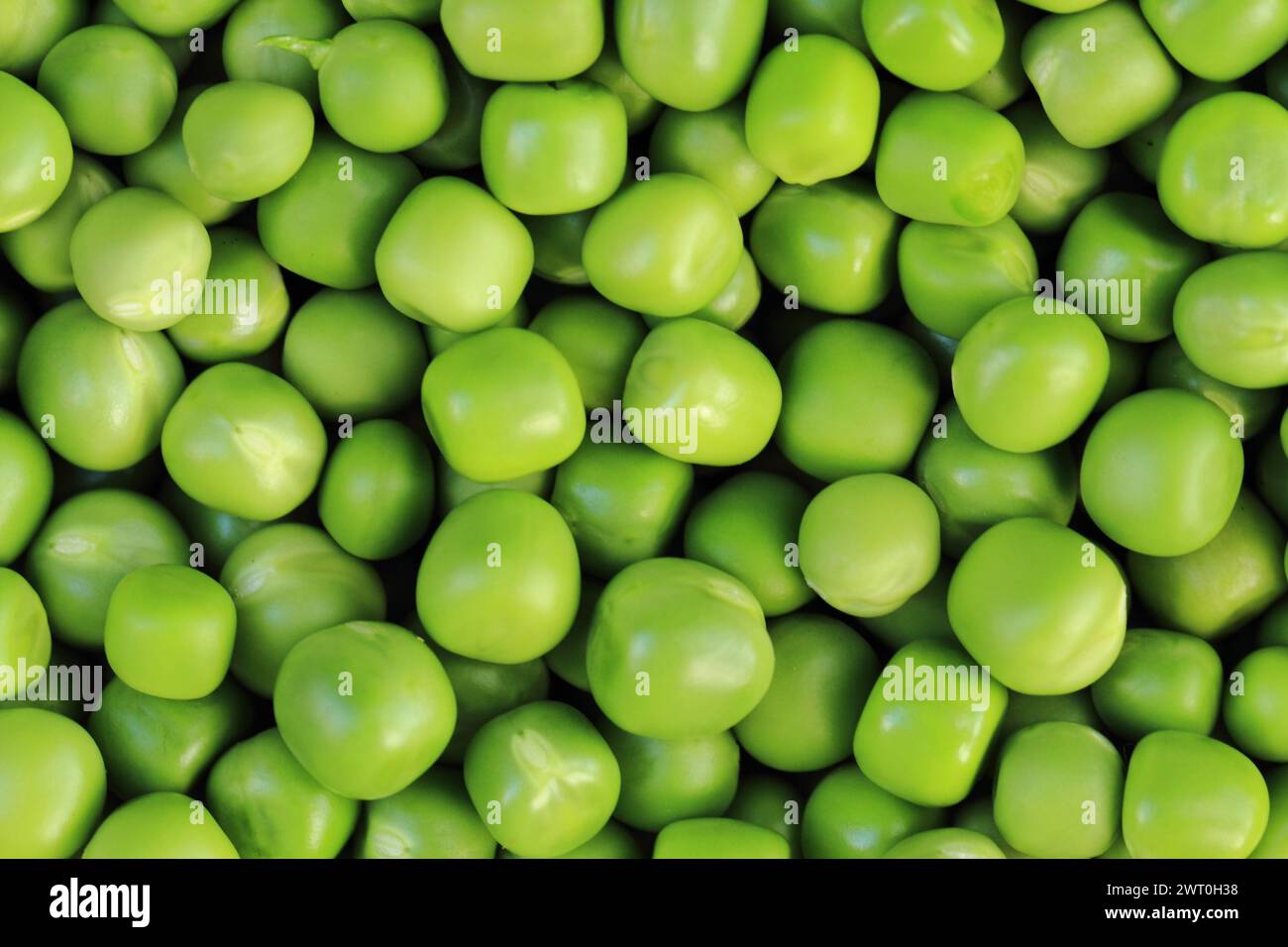 fresh green pea as natural food background Stock Photo - Alamy