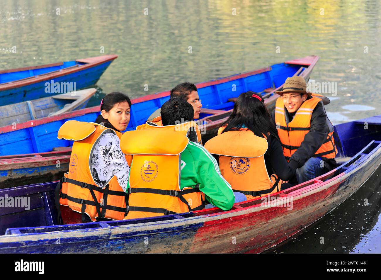 Group of people on boat hi-res stock photography and images - Alamy