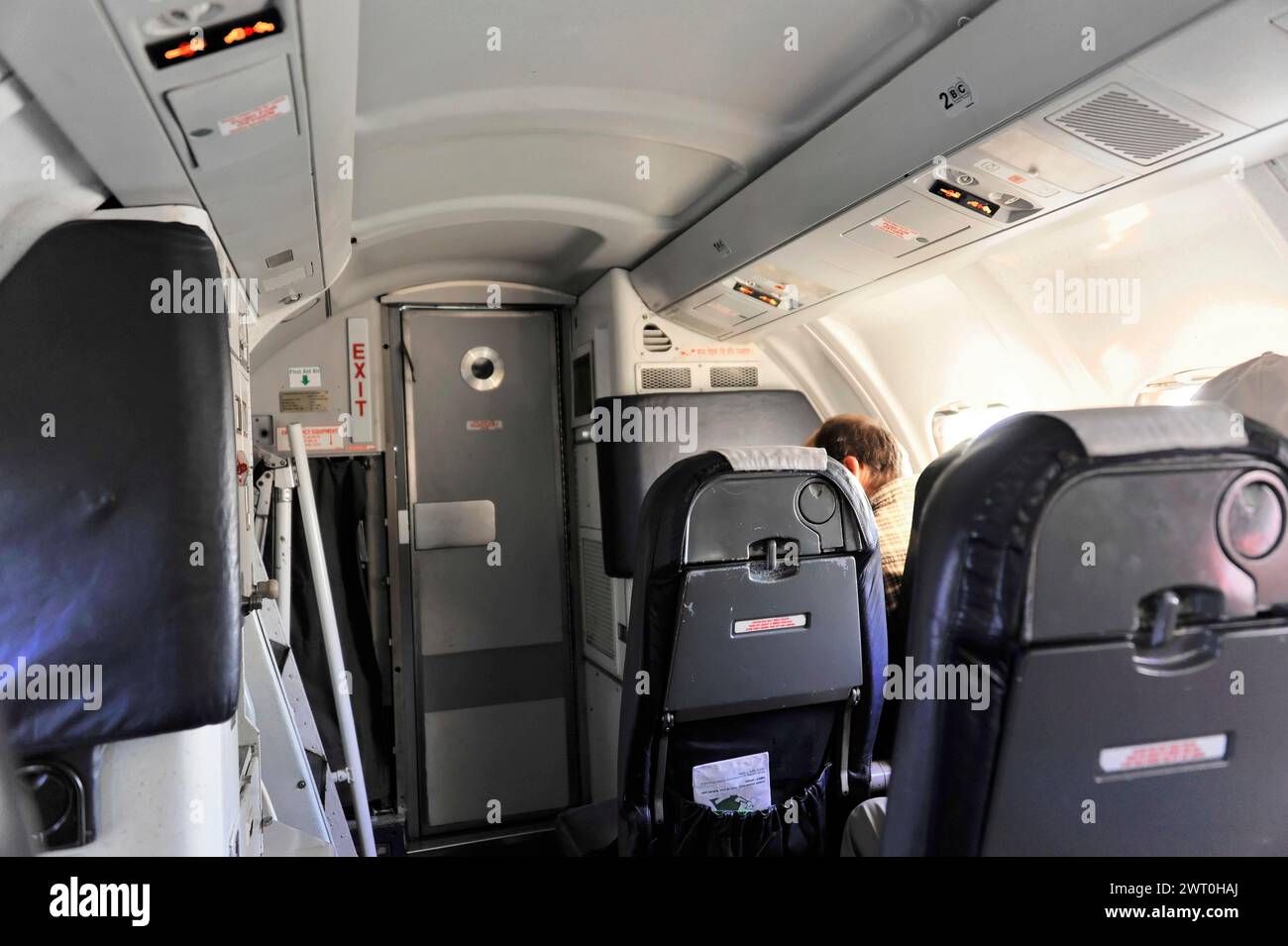 Airplane emergency exit hi-res stock photography and images - Alamy