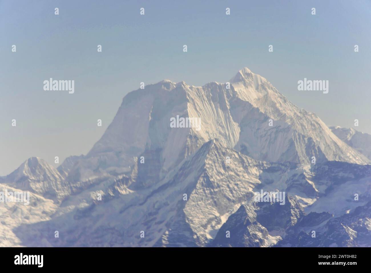 Snow-covered mountain peaks under a clear sky, impressions from the ...