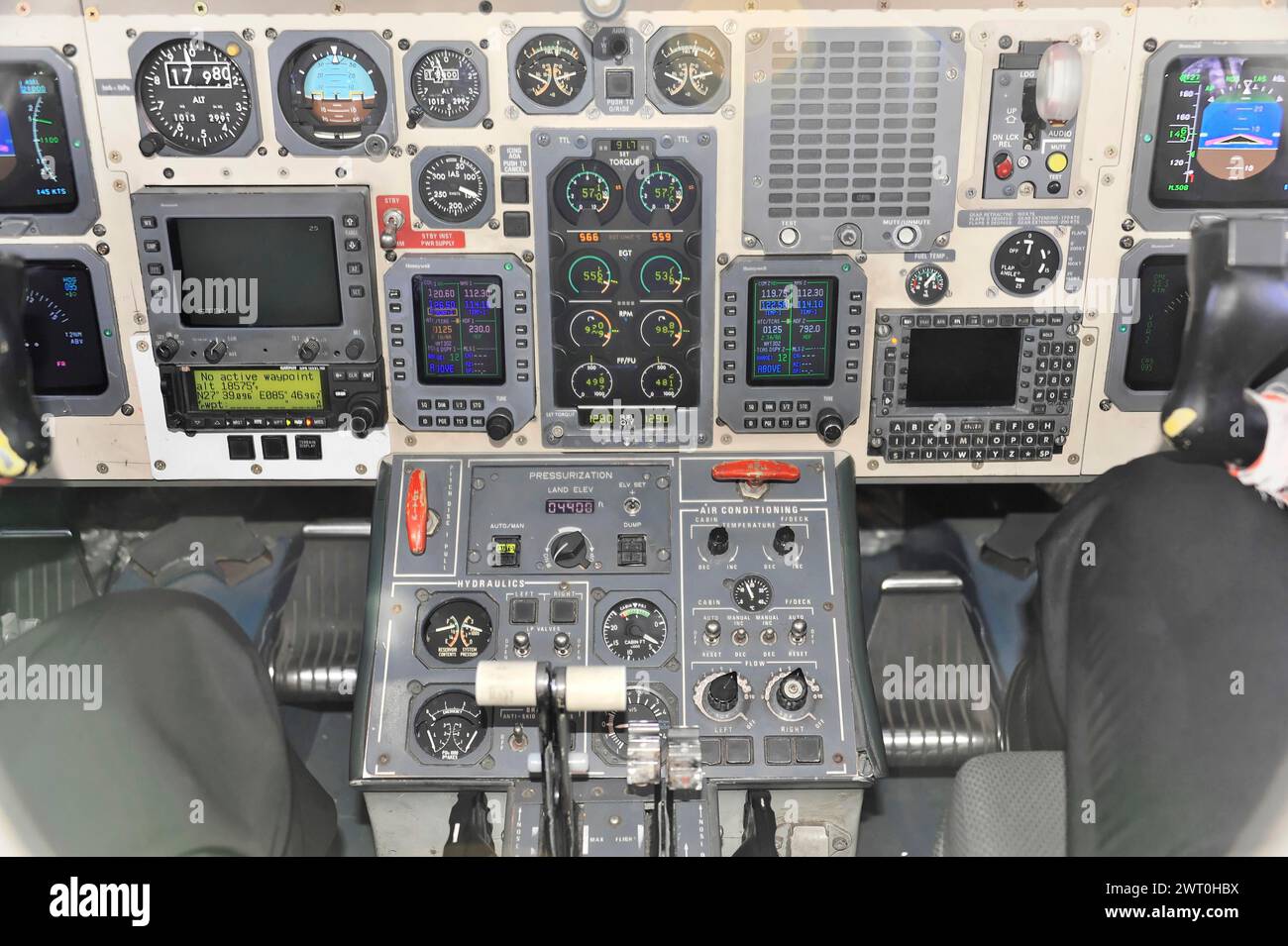 Detailed view of the cockpit of an aeroplane with control units ...