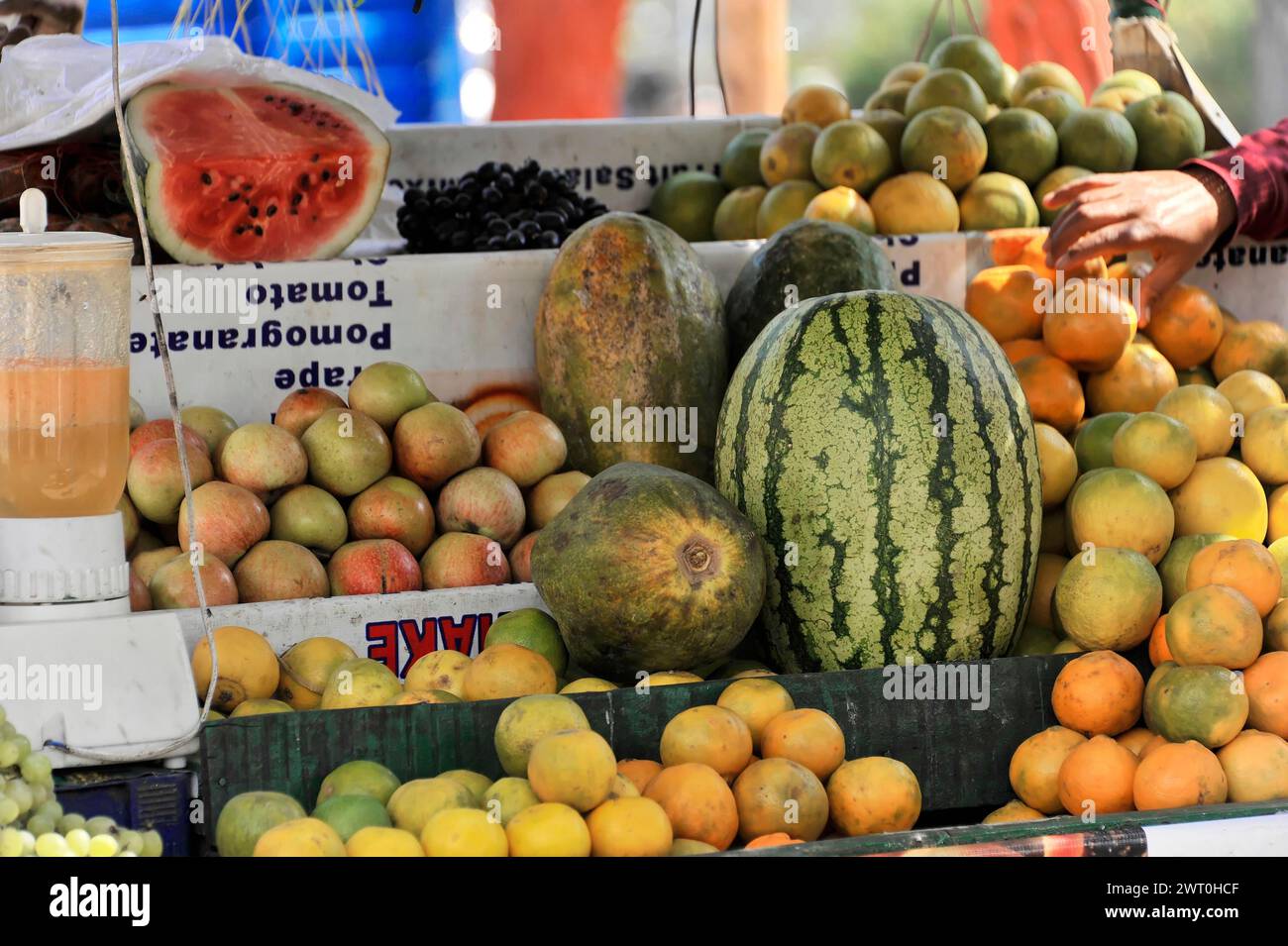 A colourful fruit stall with various fresh fruits, Pokhara Valley ...
