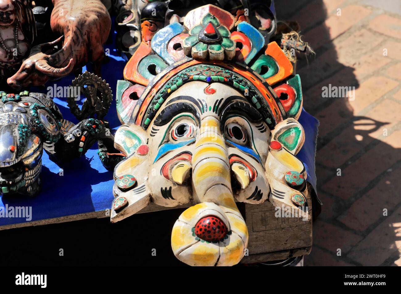 Hand-painted, colourful wooden face mask, a masterpiece of local ...