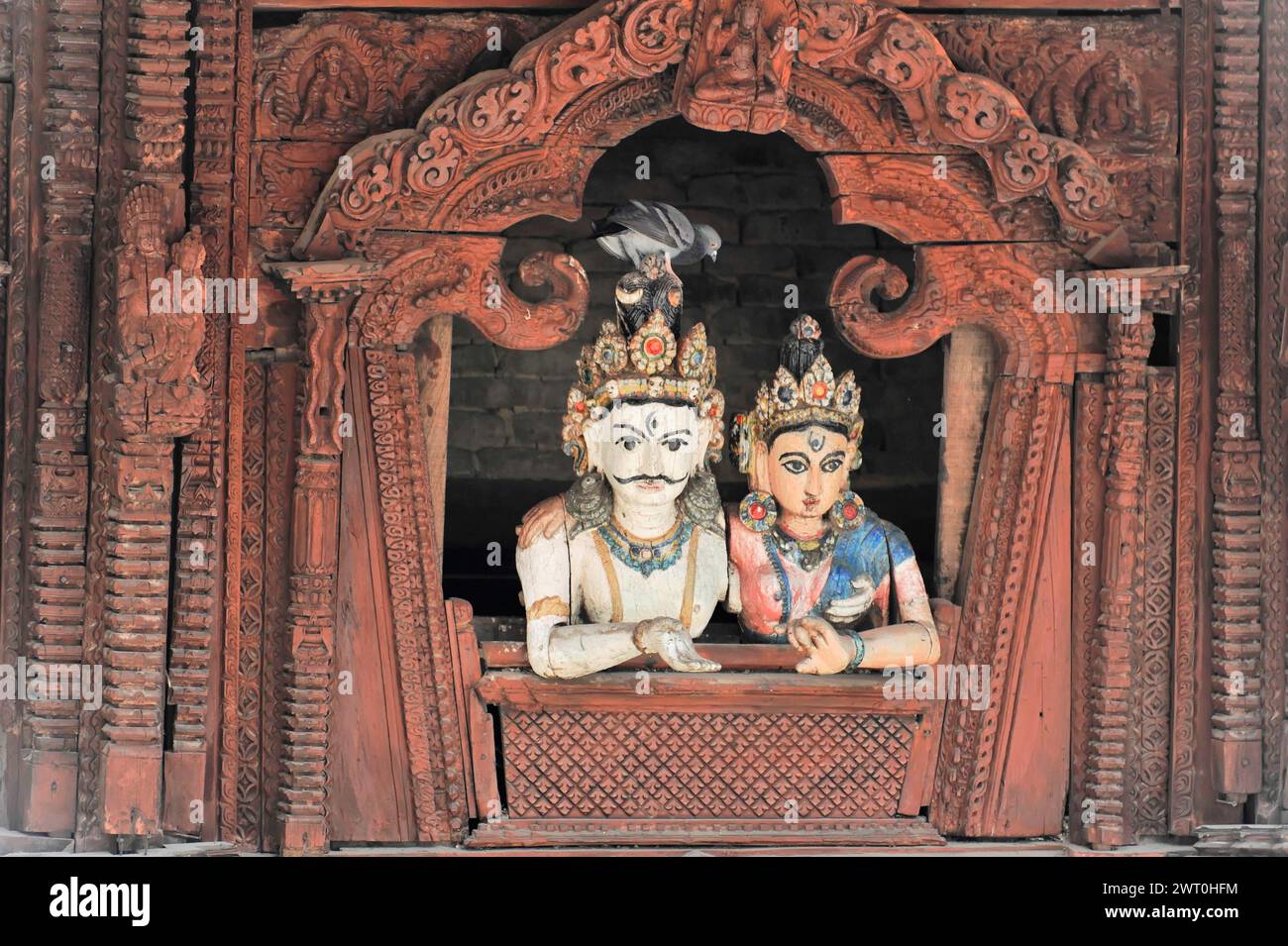 Carving of Hindu deities in a temple window, Kathmandu Valley, Nepal ...