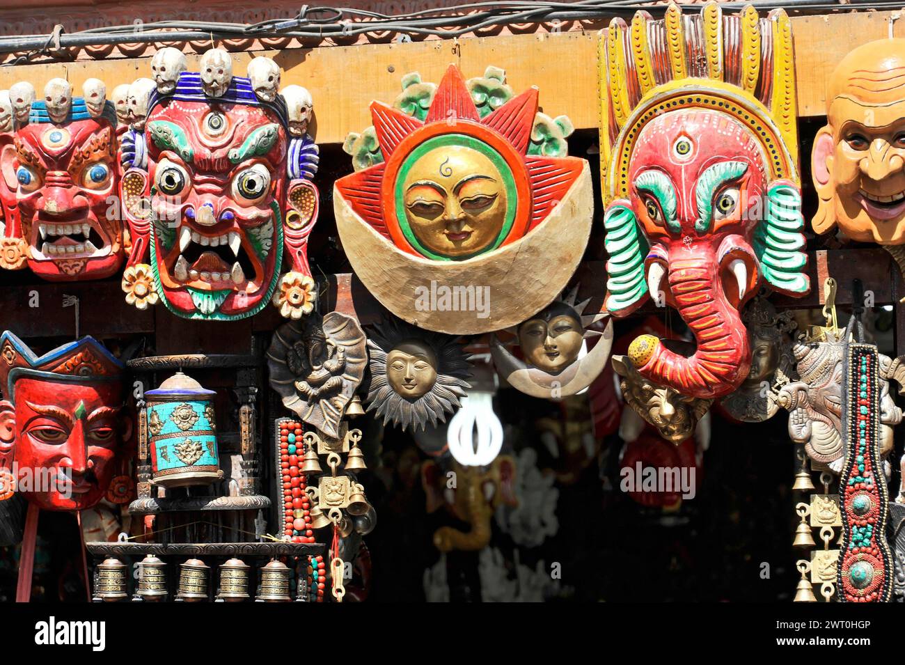 Colourful traditional Asian masks at a market stall, Kathmandu Valley ...