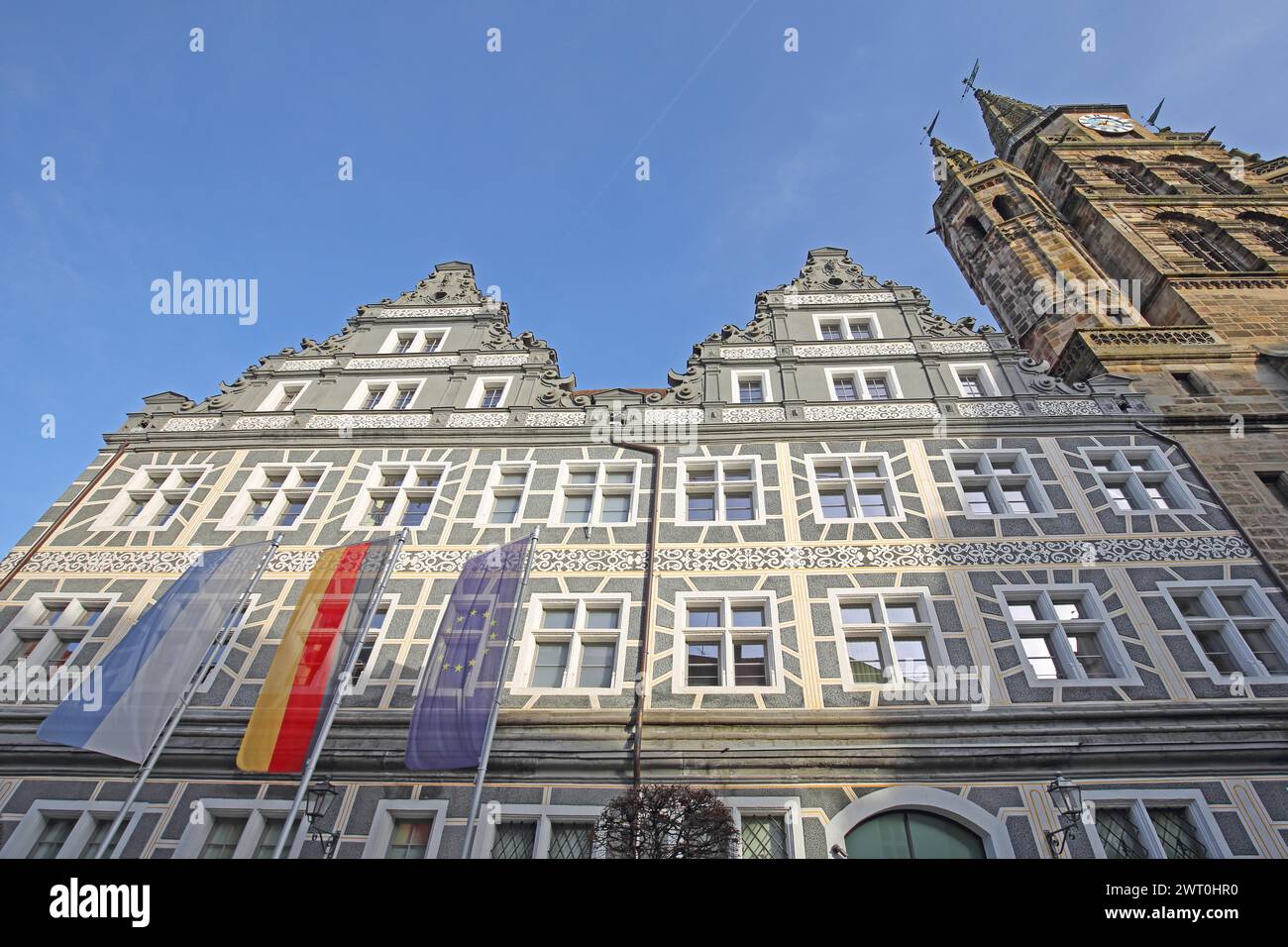 Renaissance building with sgraffiti and flags, EU flag, German state ...