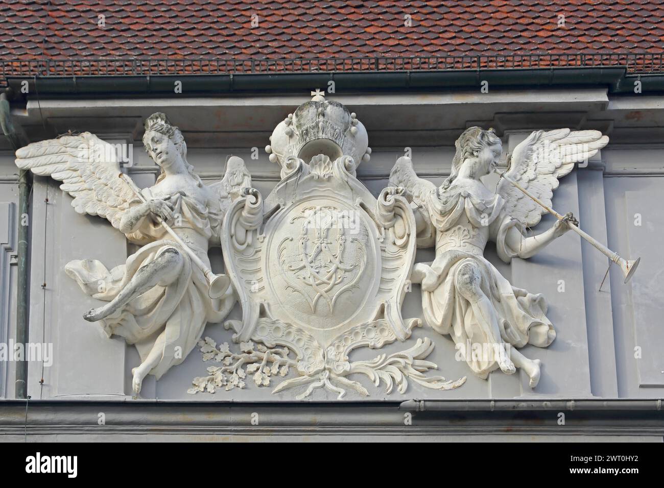 City coat of arms with two angels and trumpets, sculpture, trombones ...