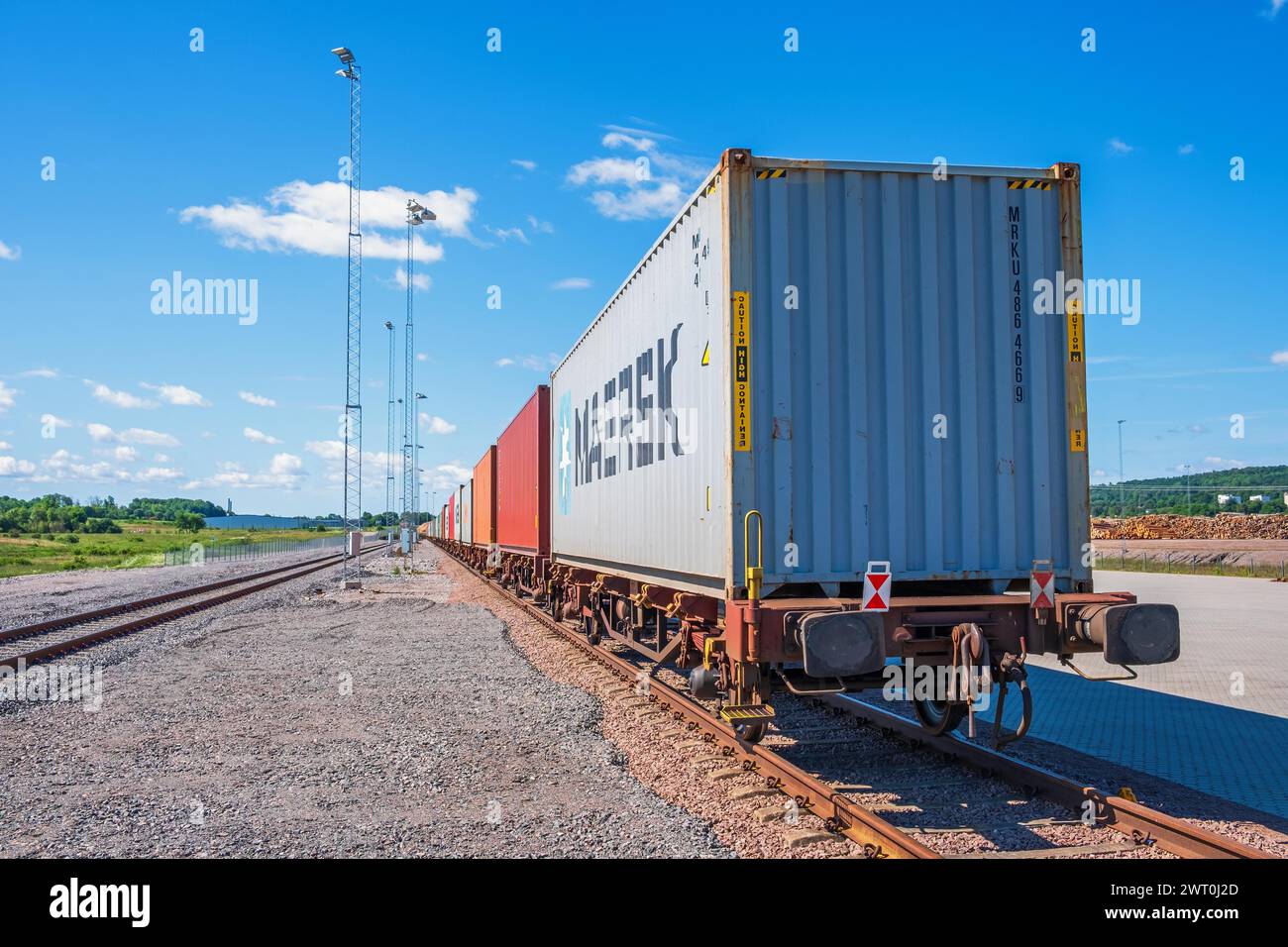 Railway wagons with shipping containers on a railway track Stock Photo ...
