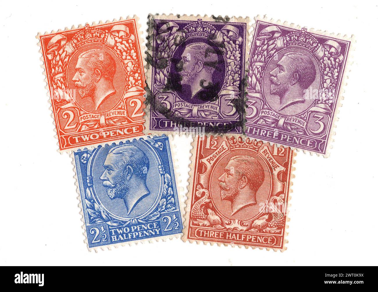 Vintage King George V postage stamps from Great Britain isolated on a ...