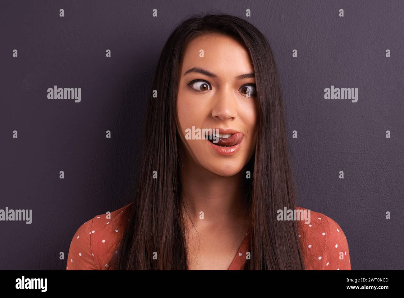 Woman, funny face and studio for comedy tongue out or mockup space ...