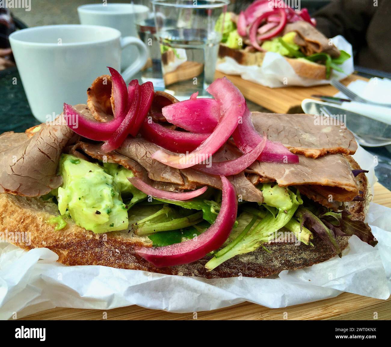 Eating delicious sandwich hi-res stock photography and images - Alamy