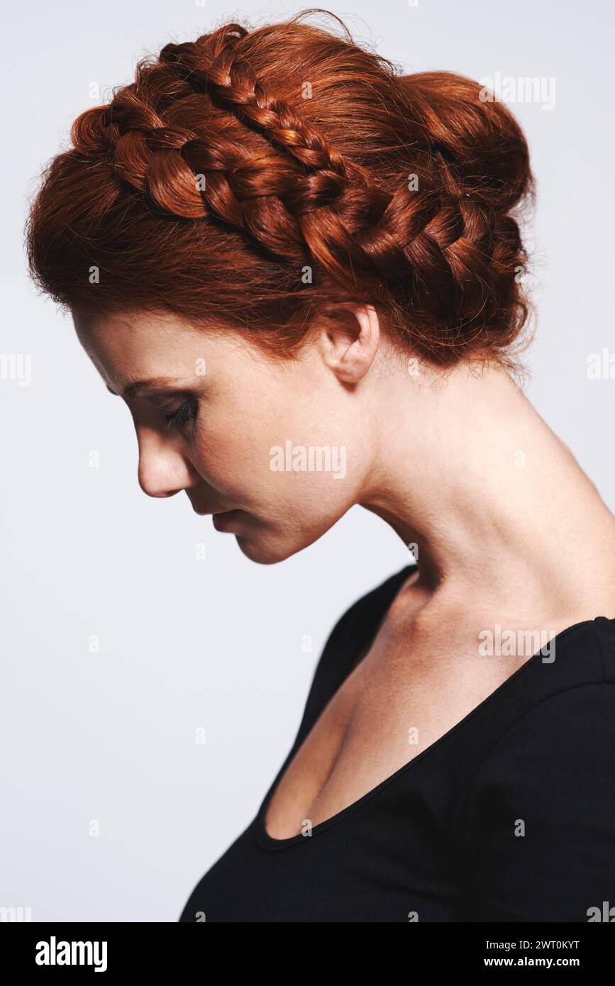 Face, beauty and haircare with plait of woman person, studio and ...