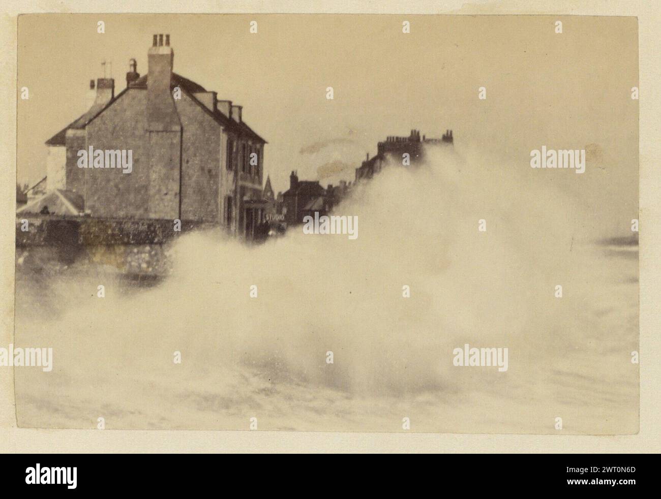 Eastbourne. Unknown, photographer 1869 A massive wave hitting a sea ...