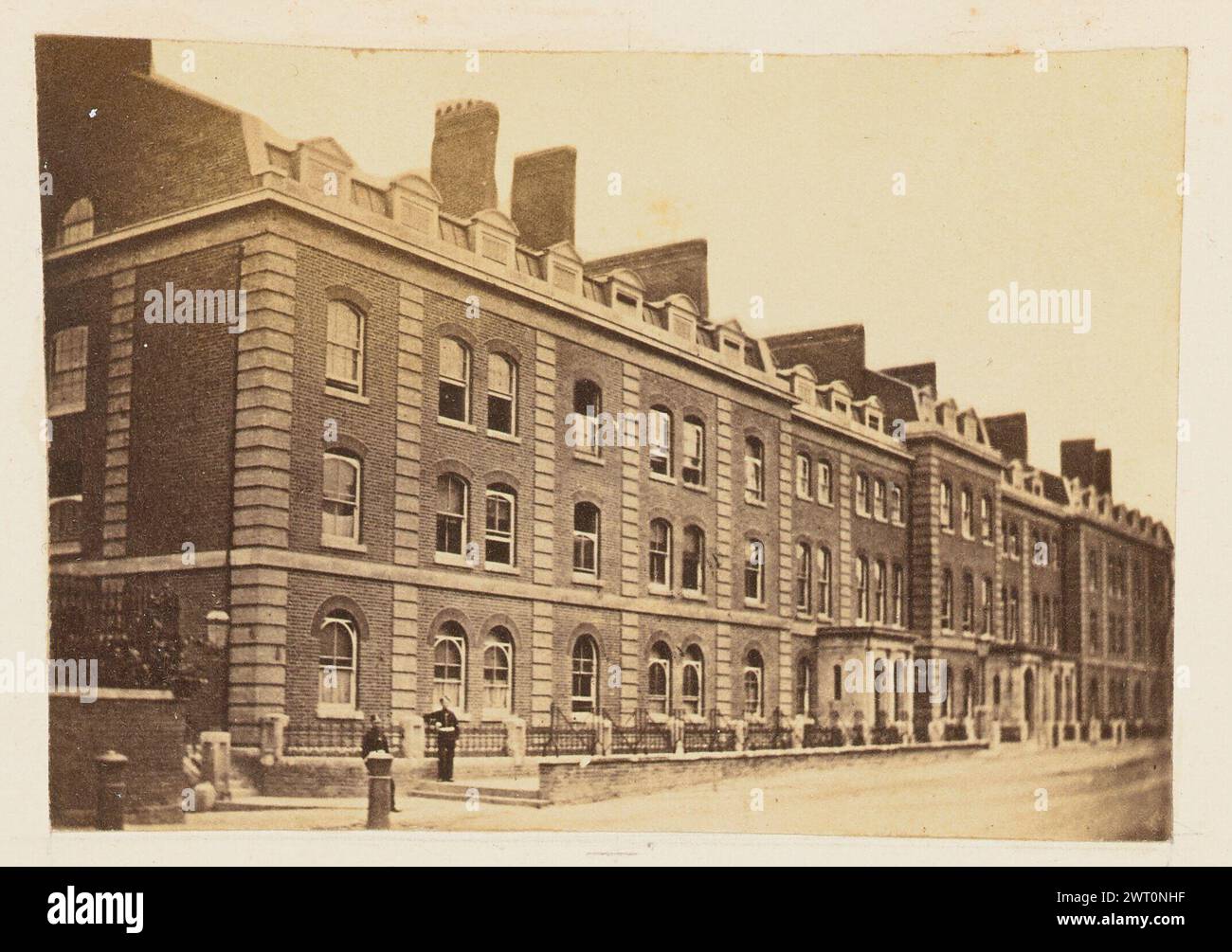 Building. Unknown, photographer about 1864 Three-quarter view of a row ...