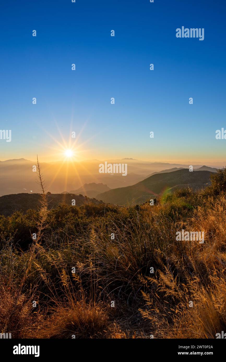 Sunburst Over Rugged Arizona Terrain at Humboldt Mountain Dawn Stock ...