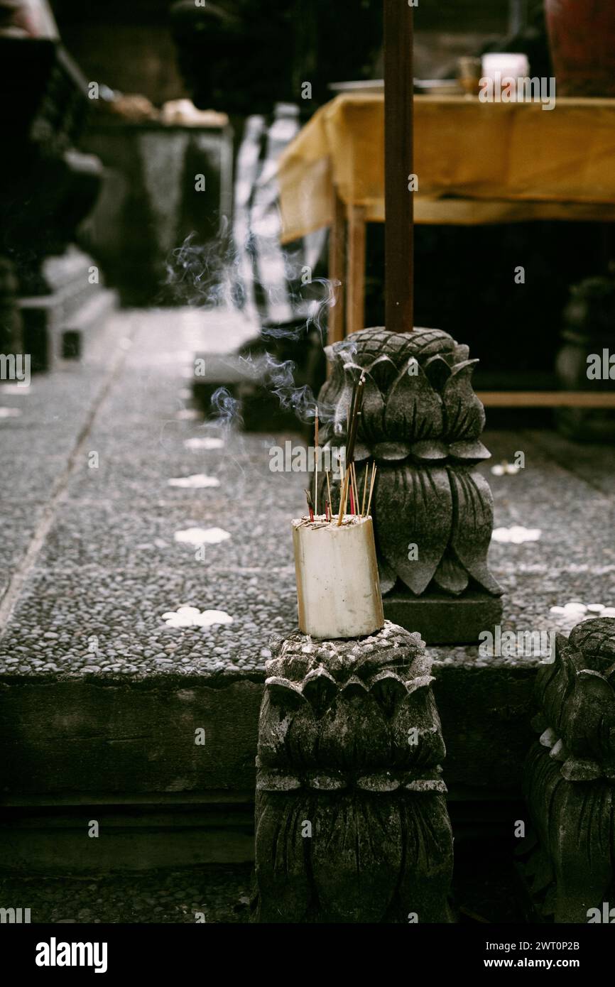 Balinese traditional ceremony, smoking incense Stock Photo - Alamy