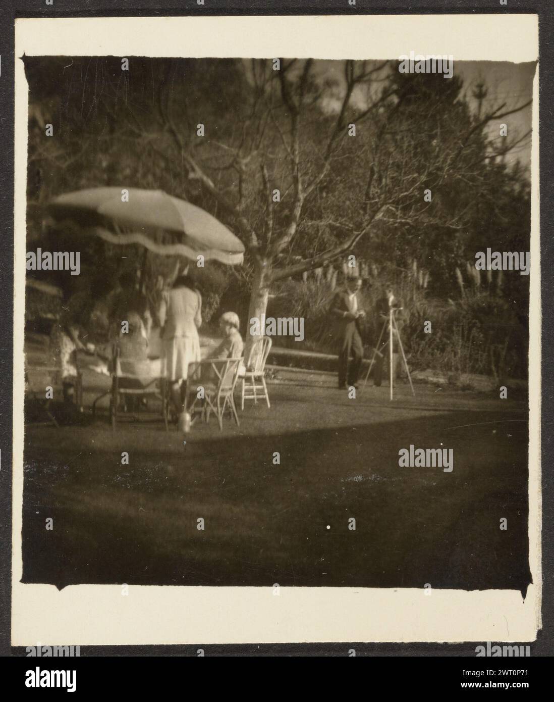 Figures and Photographer in Park. Louis Fleckenstein, photographer ...