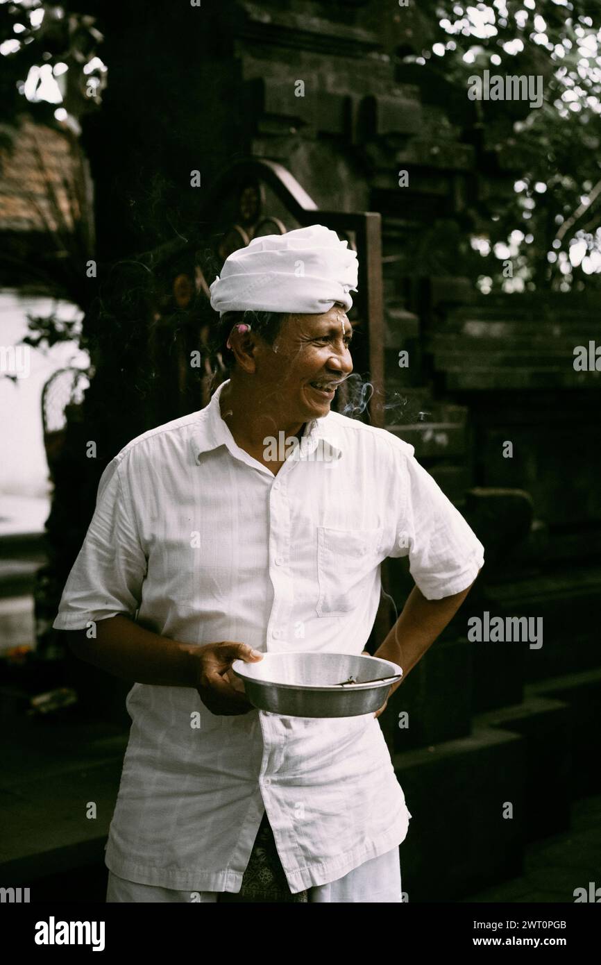 Balinese traditional ceremony, man in national costume Stock Photo - Alamy
