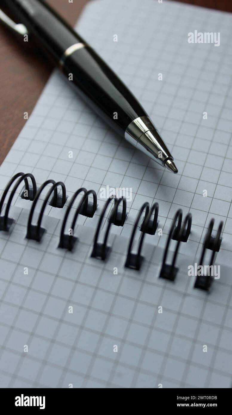 Pen on opened book hi-res stock photography and images - Alamy