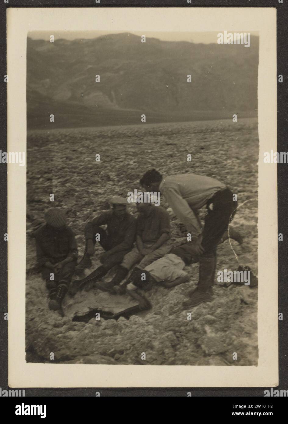 Men at Mouth of Subterraneous Cave in Rocky Landscape. Louis ...