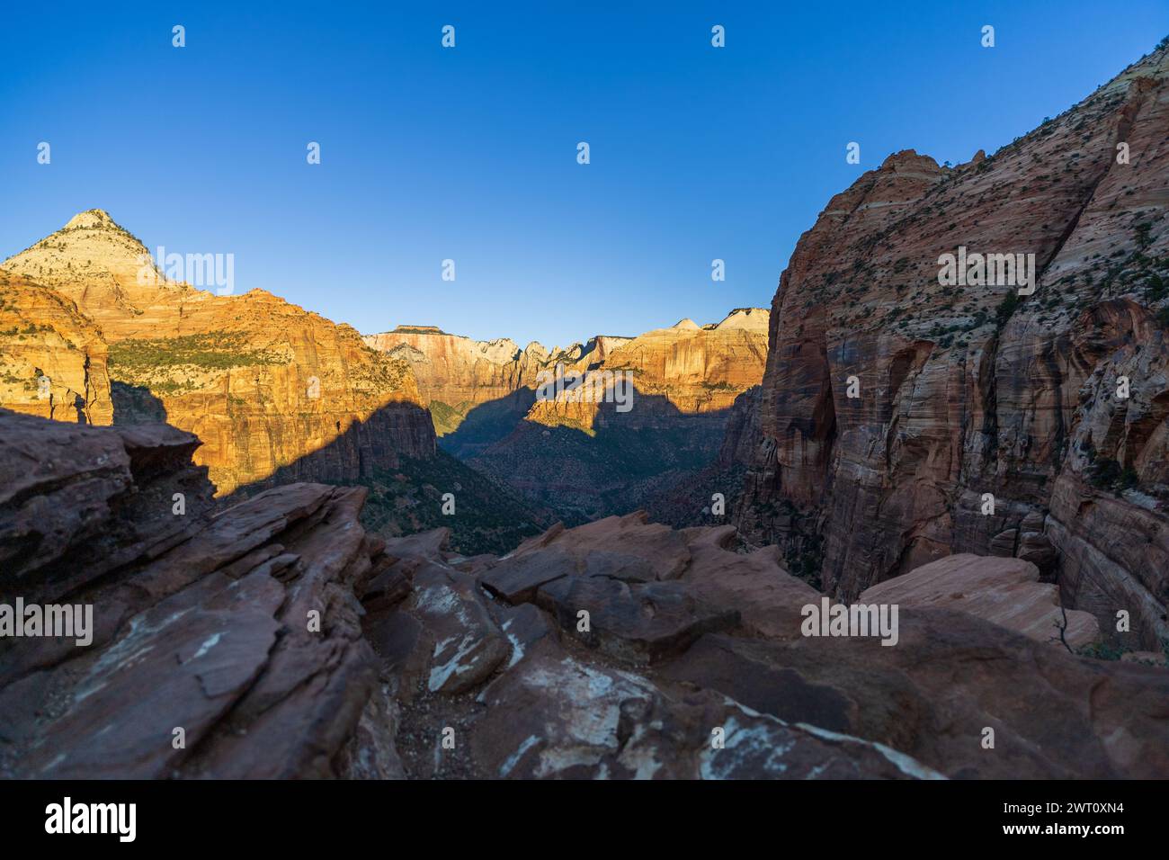 Sunrise illuminates the towering cliffs of Utah Stock Photo - Alamy